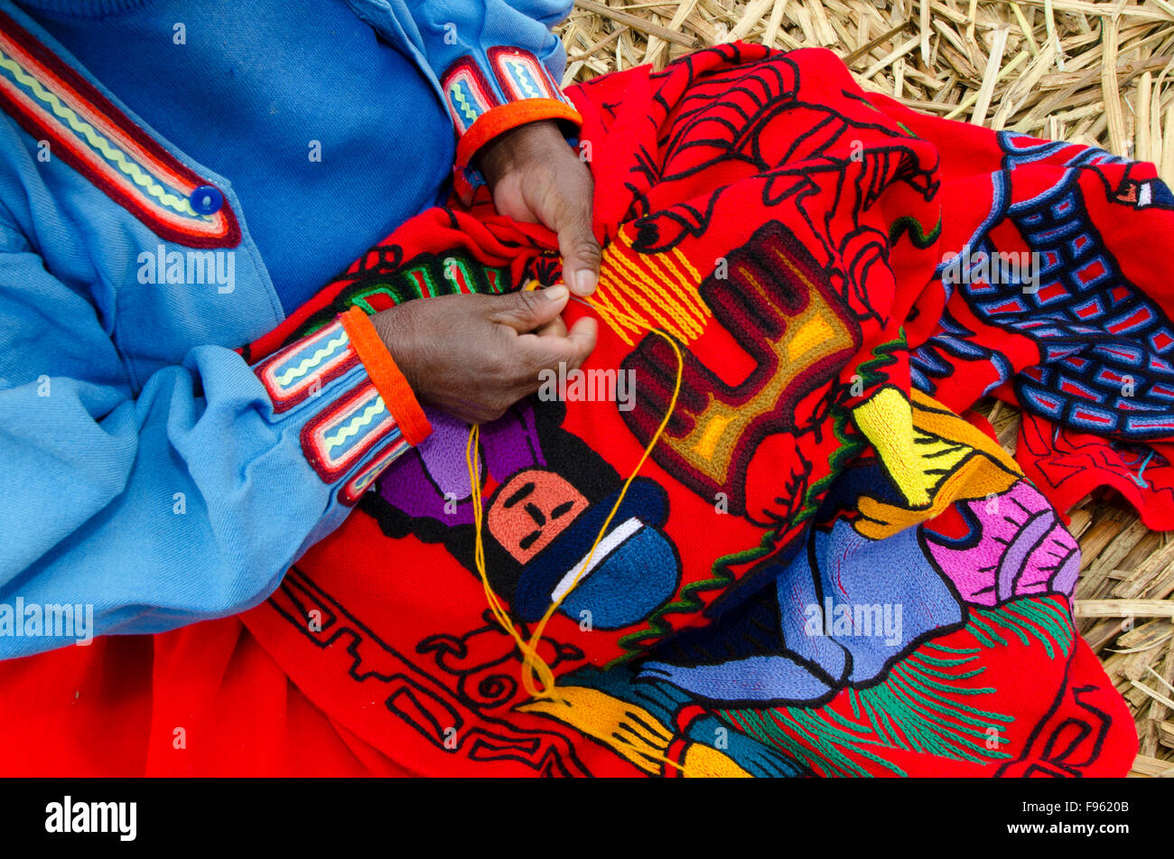Local residents of floating reed islands of Uros, Lake Titicaca, Peru ...