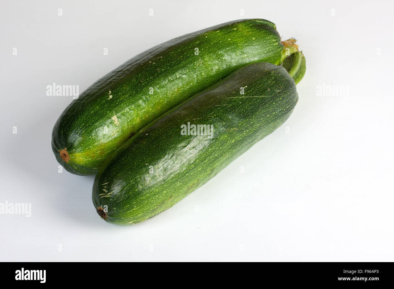 Zucchini isolated on white background Stock Photo - Alamy