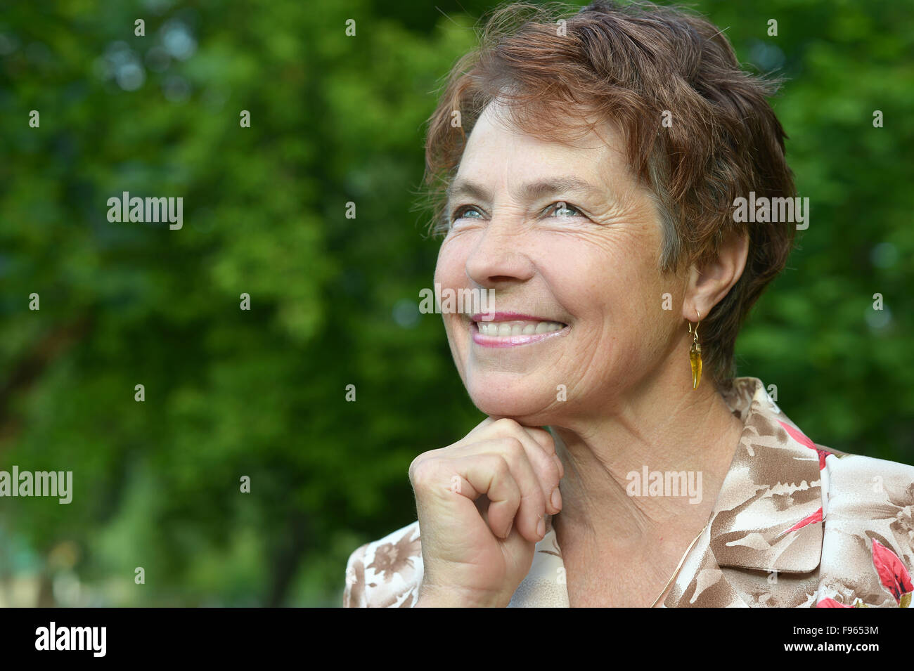 Lady enjoying summer Stock Photo - Alamy