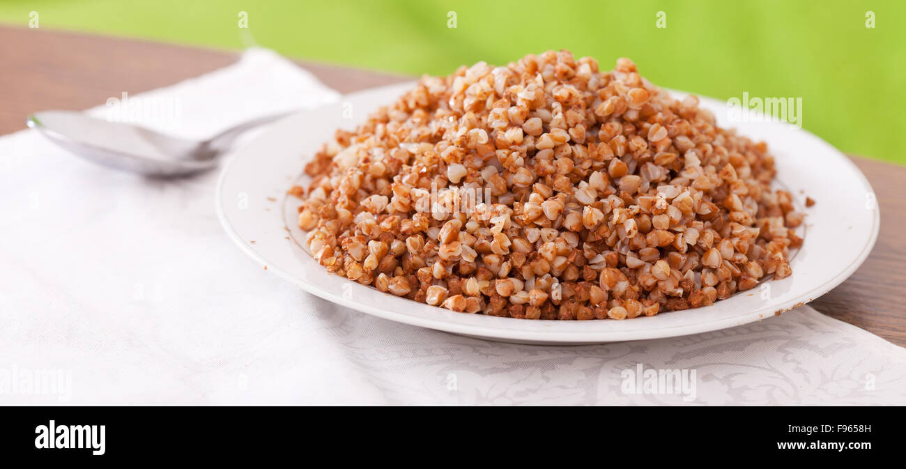 Empty buckwheat porridge in plat Stock Photo - Alamy