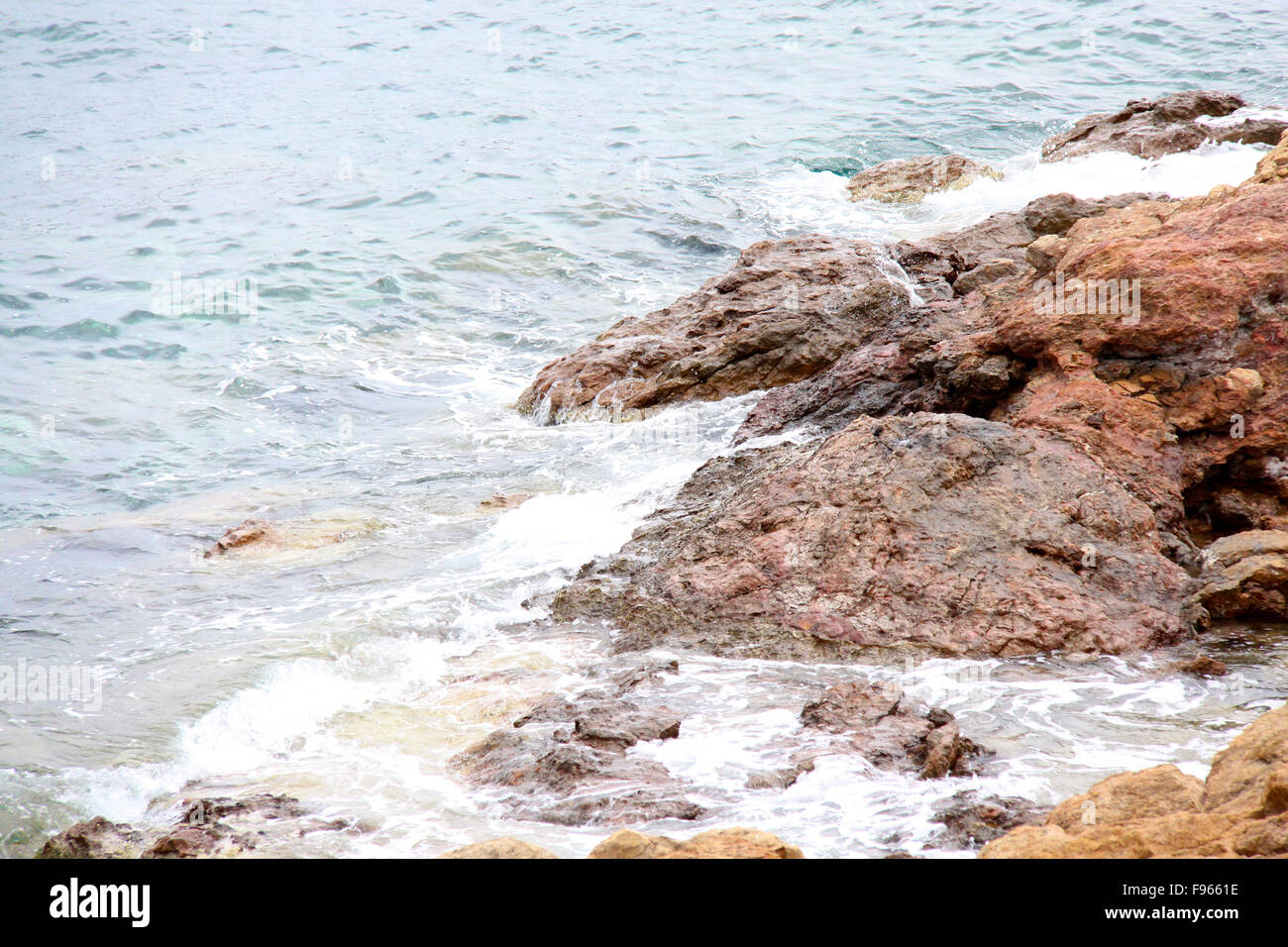 Waves on the Greek seashore Aegean sea Stock Photo - Alamy