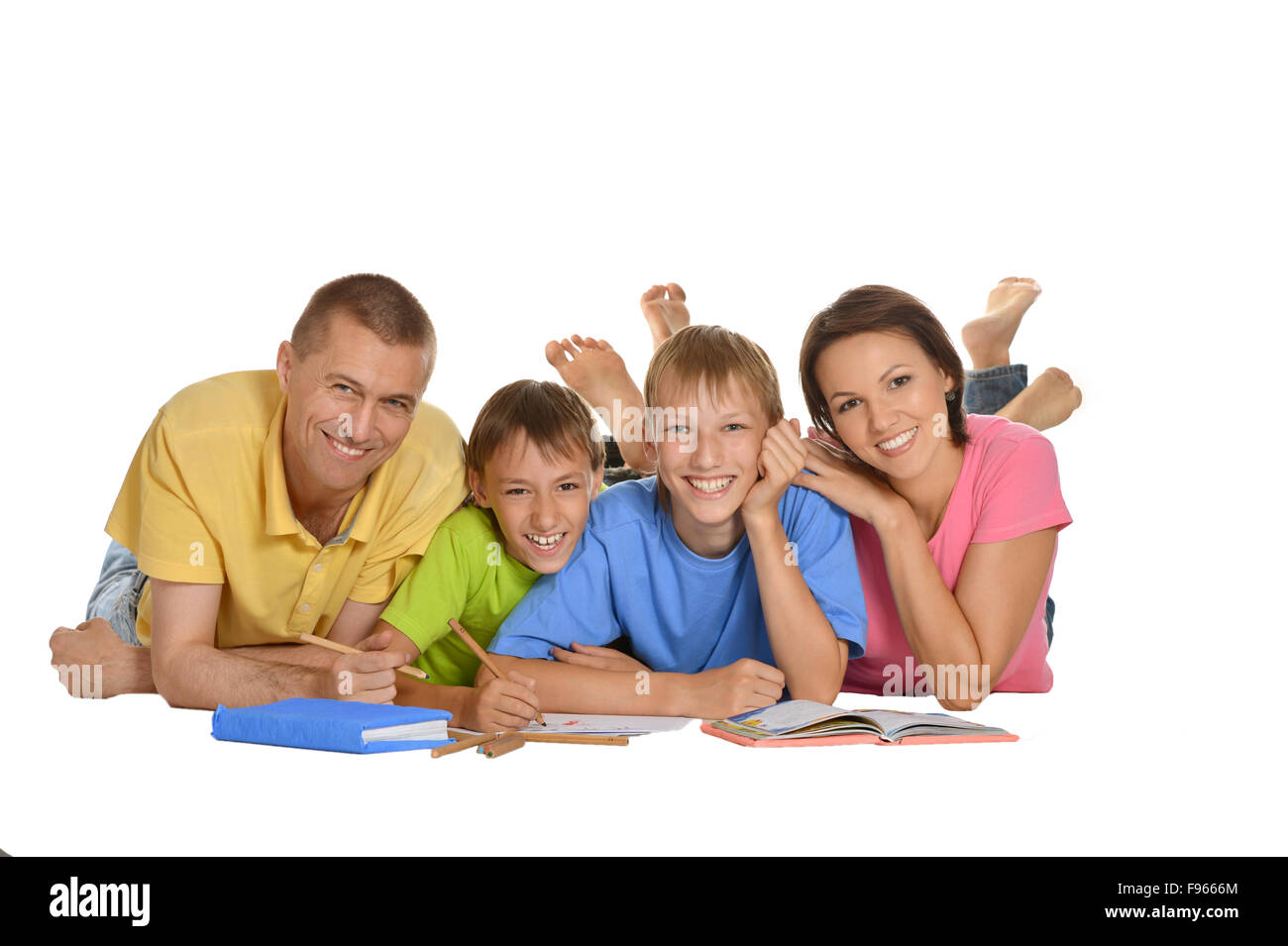Parents help children do homework Stock Photo - Alamy