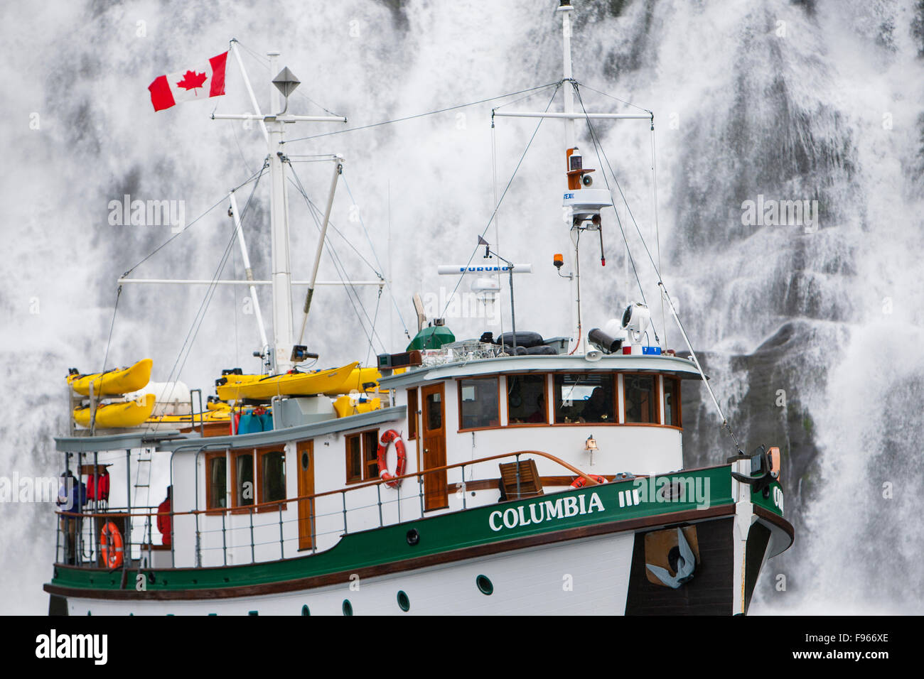 Columbia III steams in close to a waterfall while transiting waters in ...