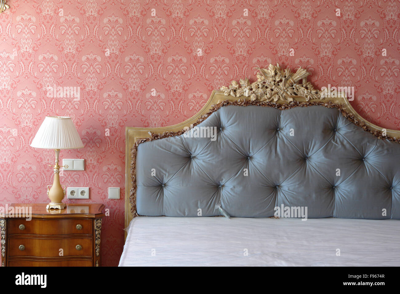 big bed with high headboard Stock Photo - Alamy