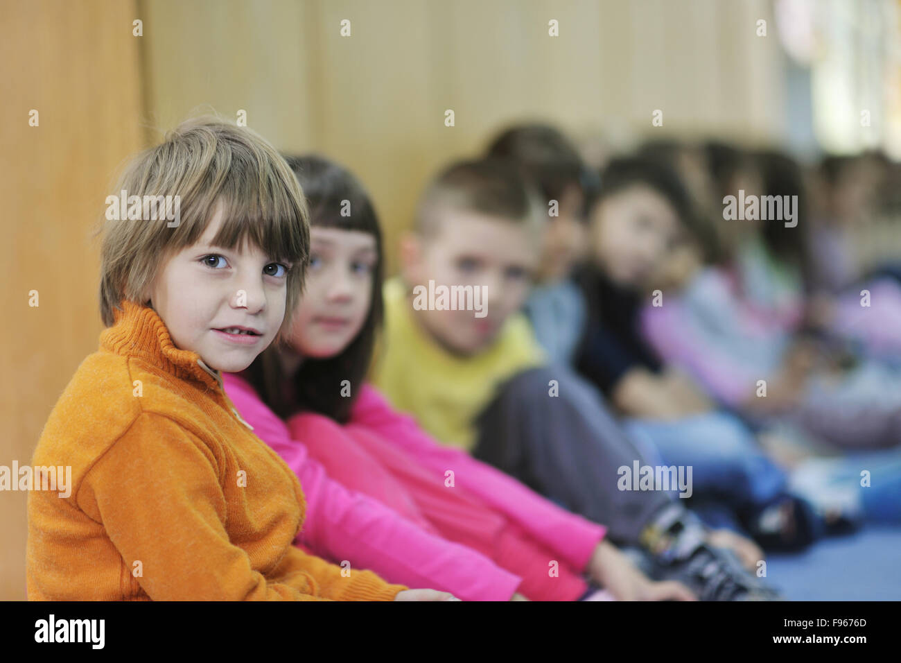happy child kids group have fun and play at kindergarden indoor ...