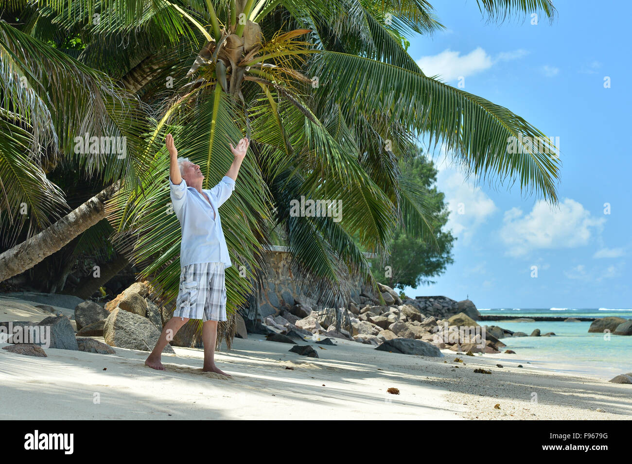 elderly man on beach Stock Photo - Alamy
