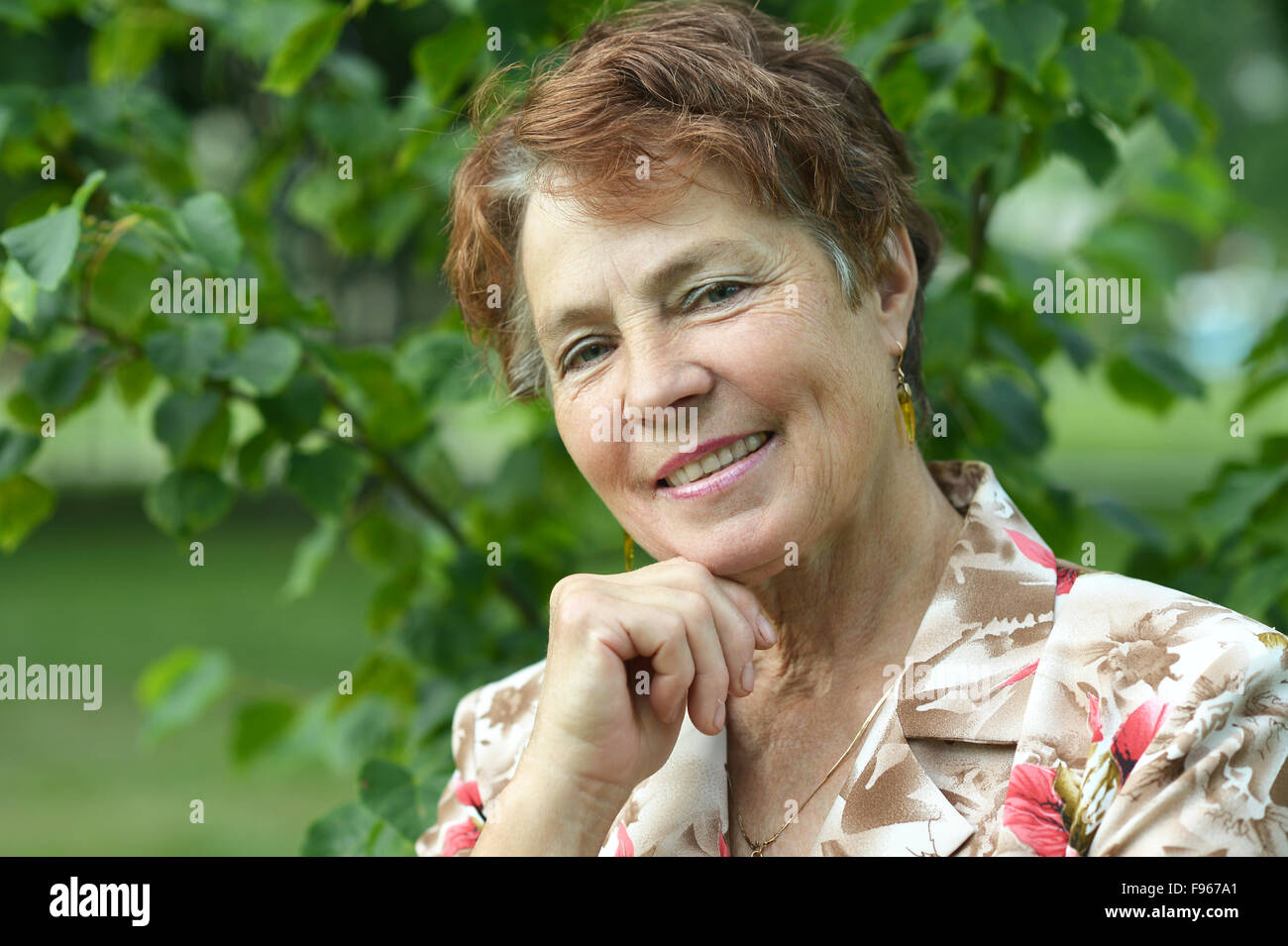 Lady enjoying summer Stock Photo - Alamy