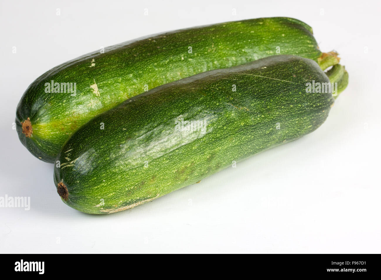 Zucchini isolated on white background Stock Photo - Alamy