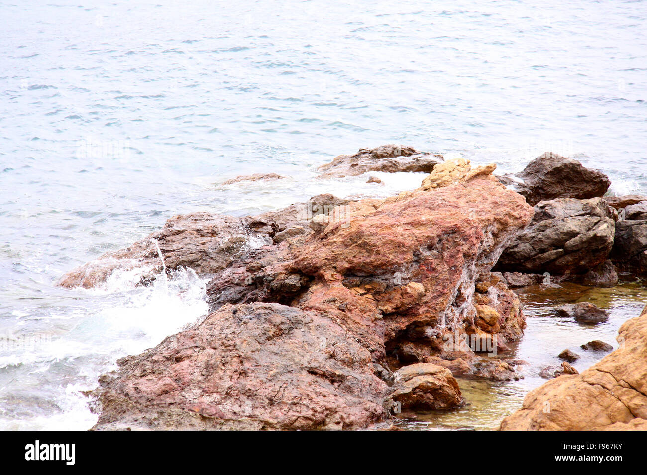 Waves on the Greek seashore Aegean sea Stock Photo - Alamy