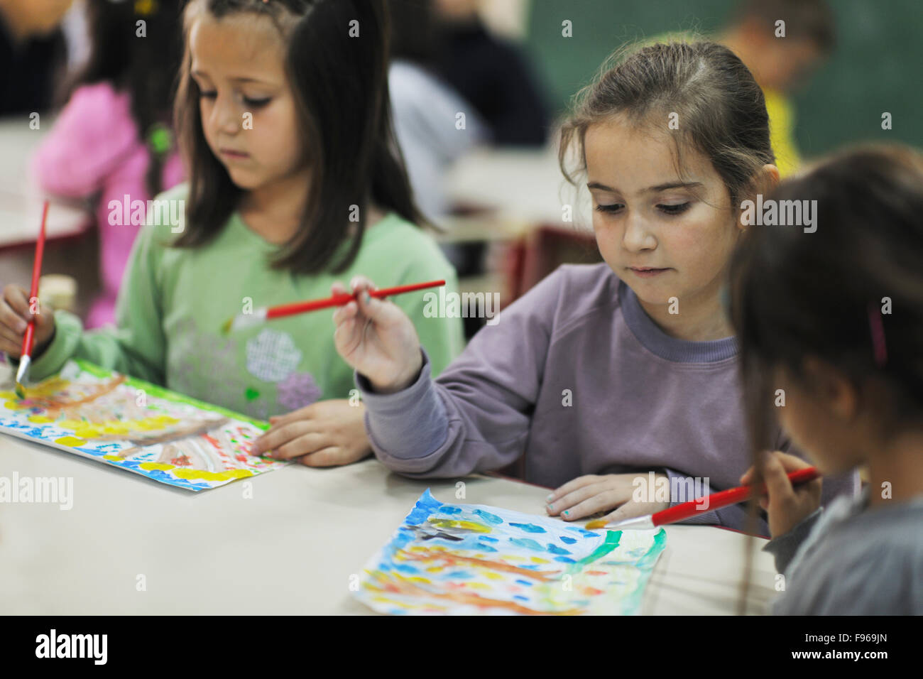 happy child kids group have fun and play at kindergarden indoor ...