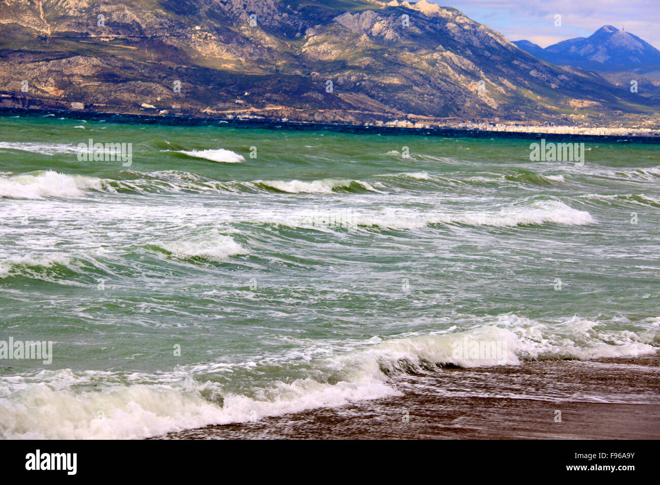 Waves on the Greek seashore Aegean sea Stock Photo - Alamy
