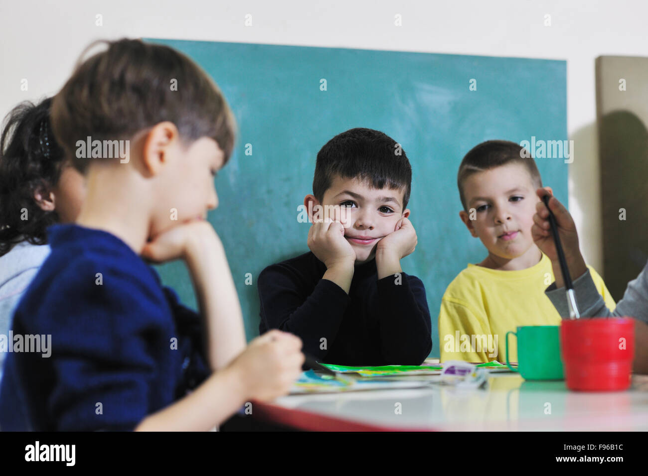 happy child kids group have fun and play at kindergarden indoor ...