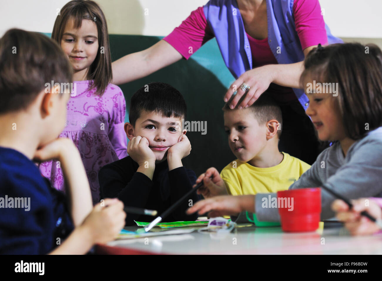 happy child kids group have fun and play at kindergarden indoor ...