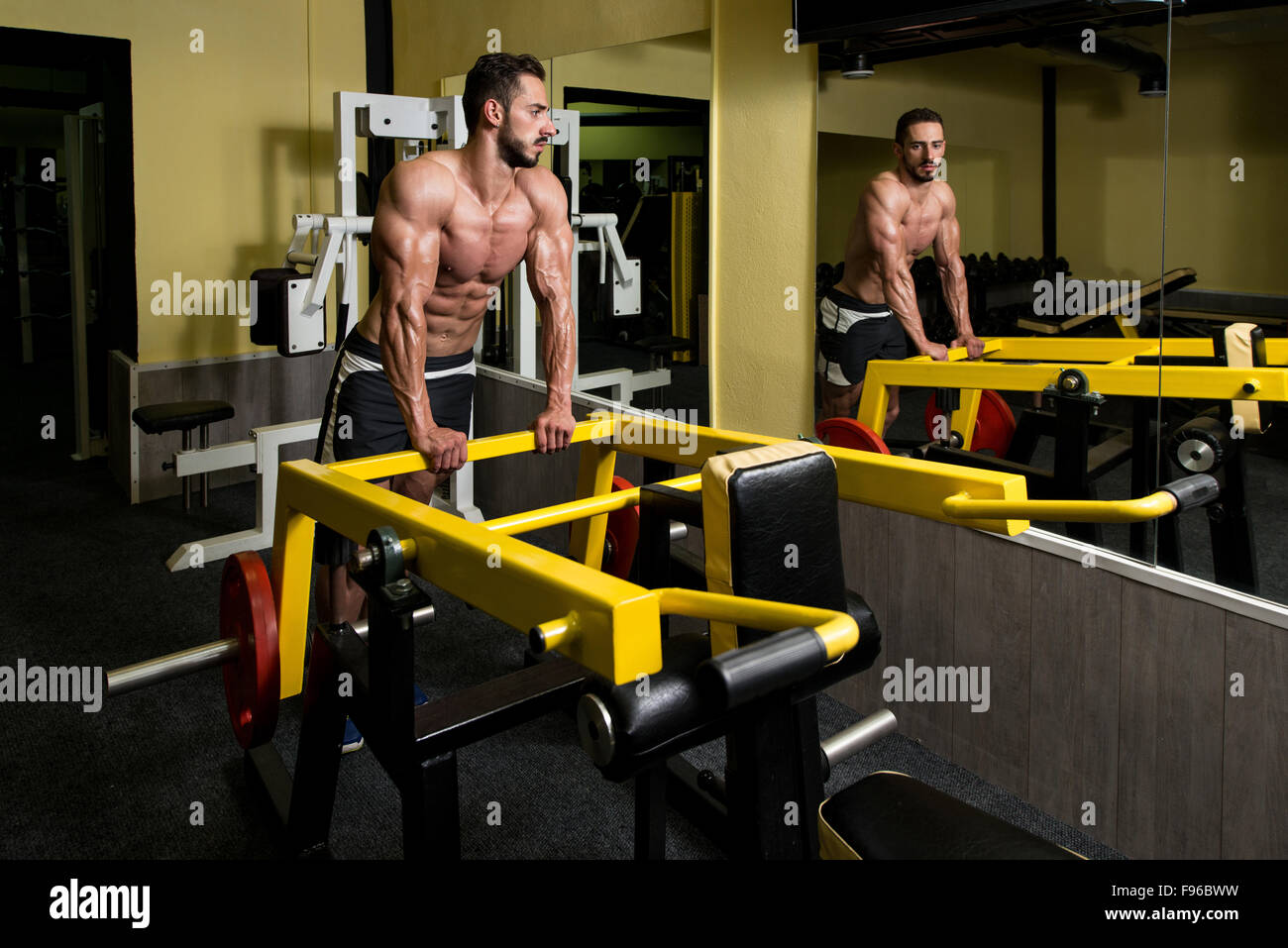 Healthy Young Man Resting In Healthy Club After Exercising Stock Photo ...