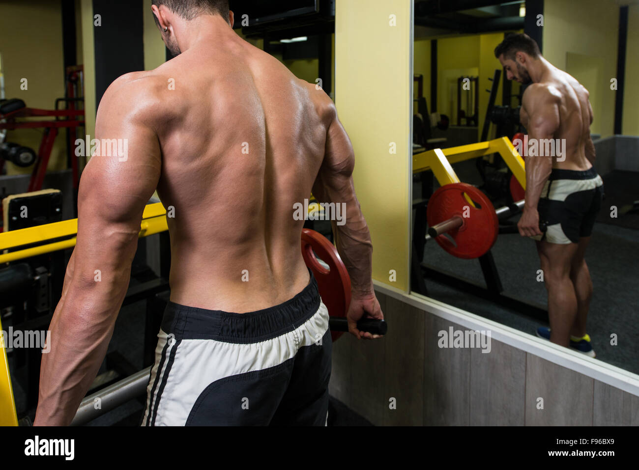 Young Bodybuilder Doing Heavy Weight Exercise For Back Stock Photo - Alamy
