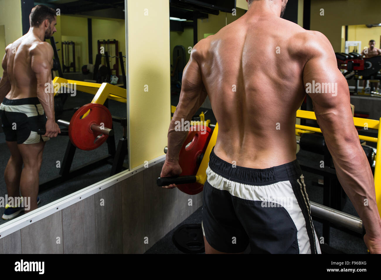 Young Bodybuilder Doing Heavy Weight Exercise For Back Stock Photo - Alamy