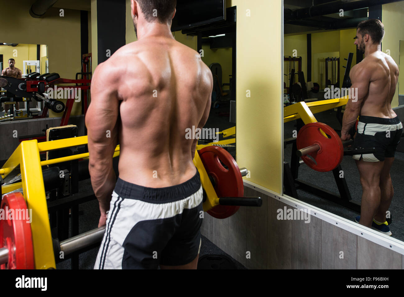 Young Bodybuilder Doing Heavy Weight Exercise For Back Stock Photo - Alamy