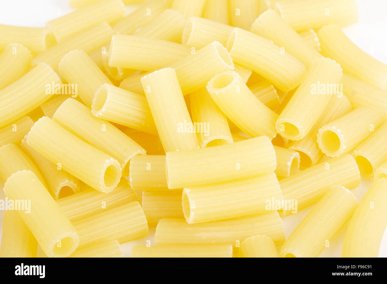 Close up of raw italian pasta on white Stock Photo - Alamy