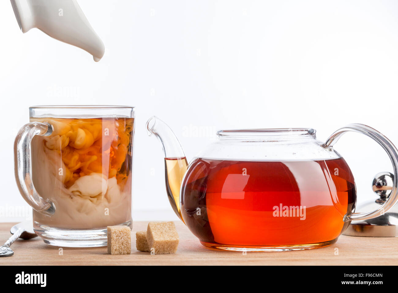 Tea pouring teapot hi-res stock photography and images - Alamy