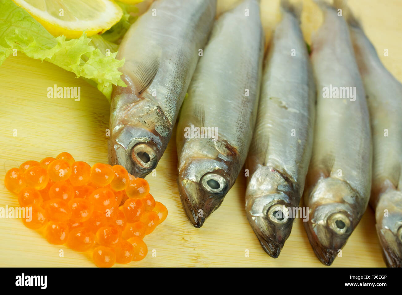 some smelts isolated on white background Stock Photo - Alamy