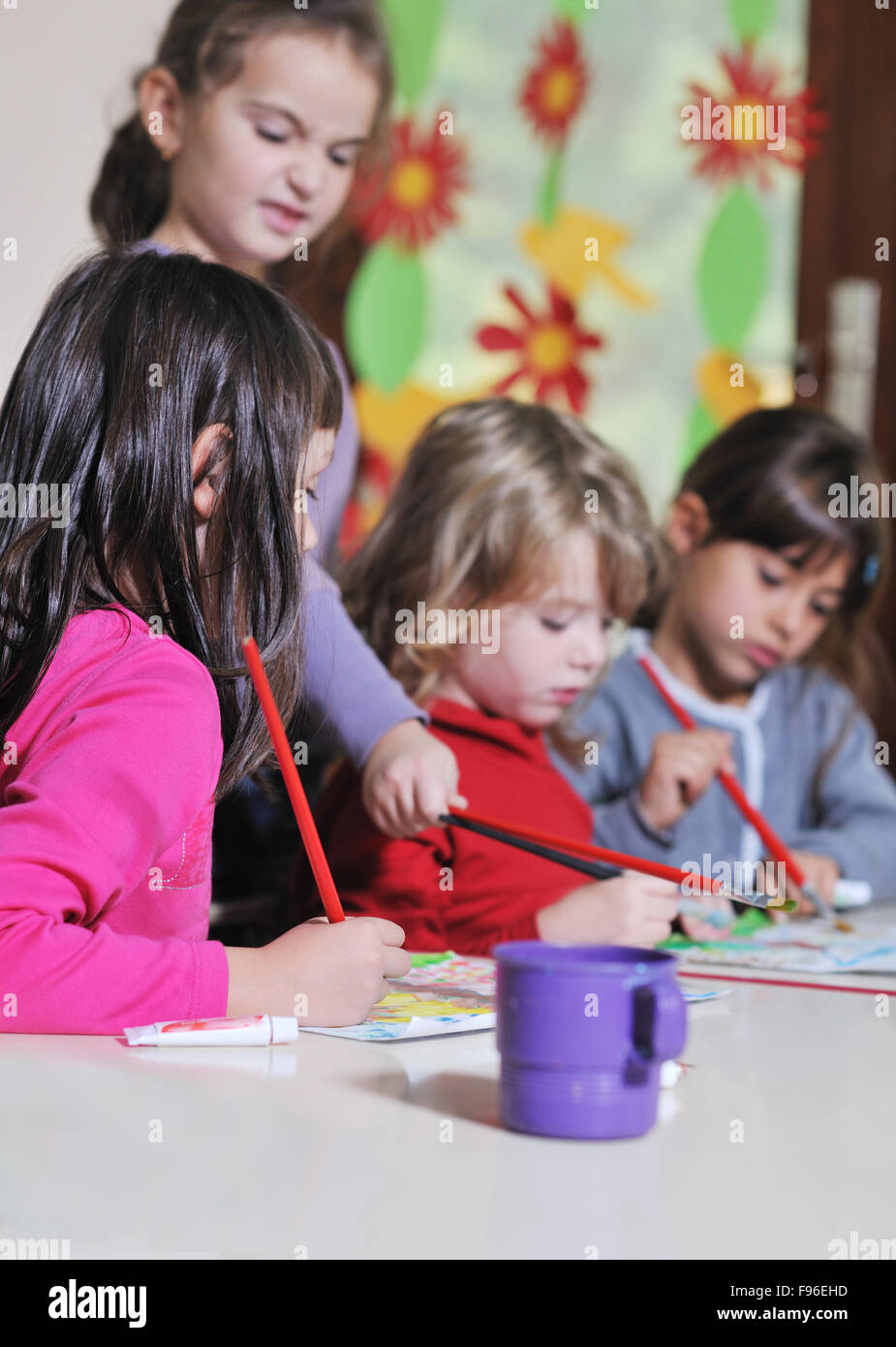 happy child kids group have fun and play at kindergarden indoor ...