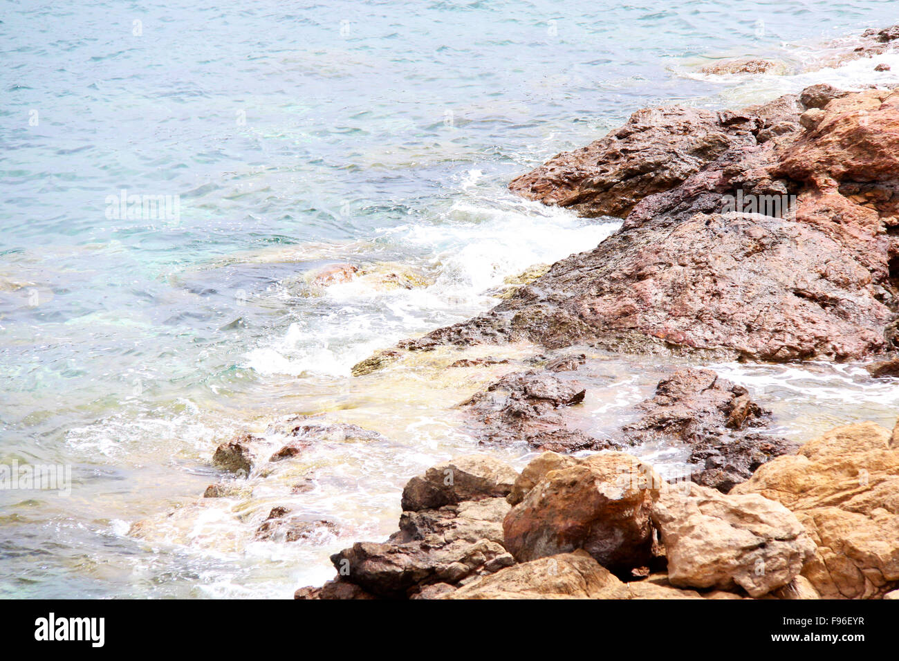 Waves on the Greek seashore Aegean sea Stock Photo - Alamy
