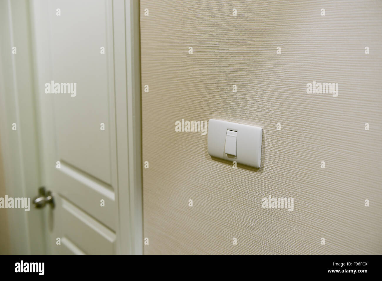 pressing electronic-light switch Stock Photo - Alamy