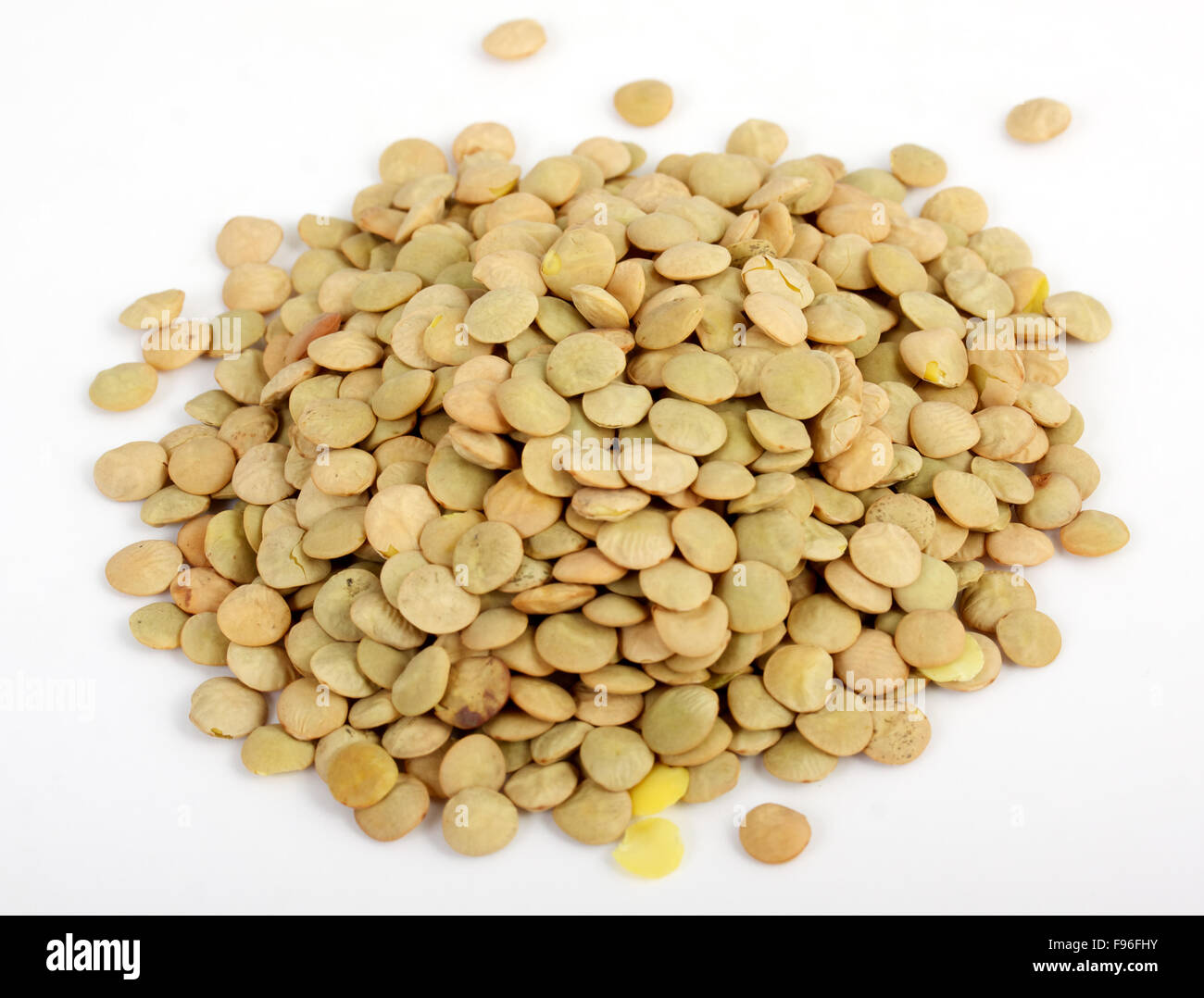 Lentil scattered on white background close up view Stock Photo - Alamy