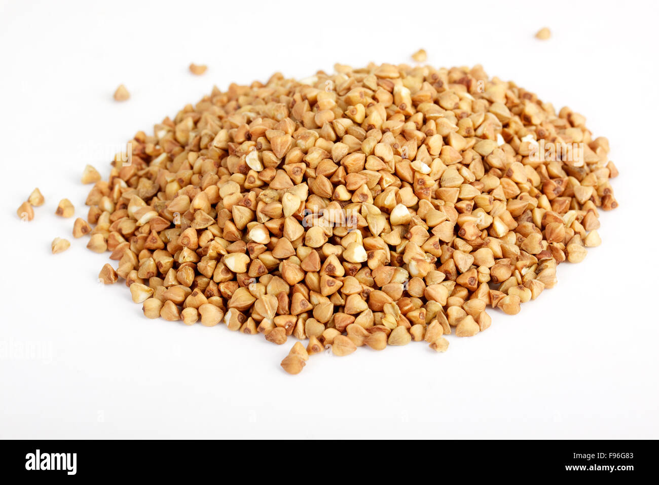 Buckwheat seeds closeup isolated on white background Stock Photo - Alamy
