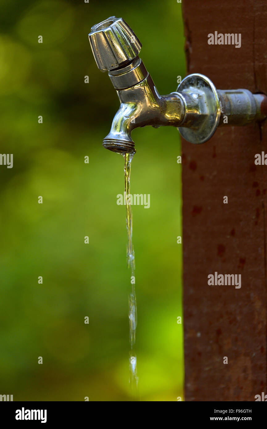 Water dripping from an outdoor tap in a recreation area on Vancouver ...