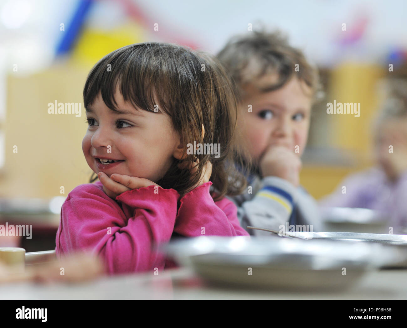 happy child kids group have fun and play at kindergarden indoor ...