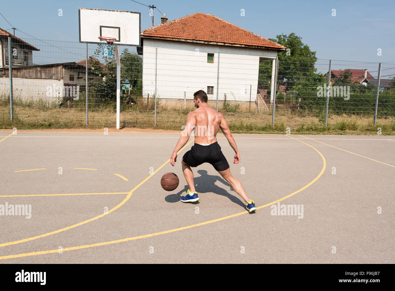 Basketball Player Bodybuilder Practicing And Posing For Basketball And ...
