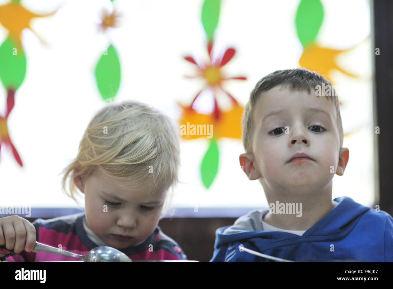 happy child kids group have fun and play at kindergarden indoor ...