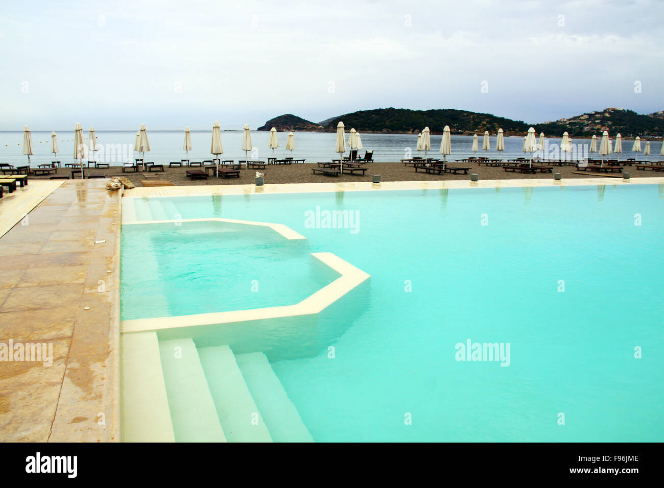 tropical swimming pool near the beach Stock Photo - Alamy