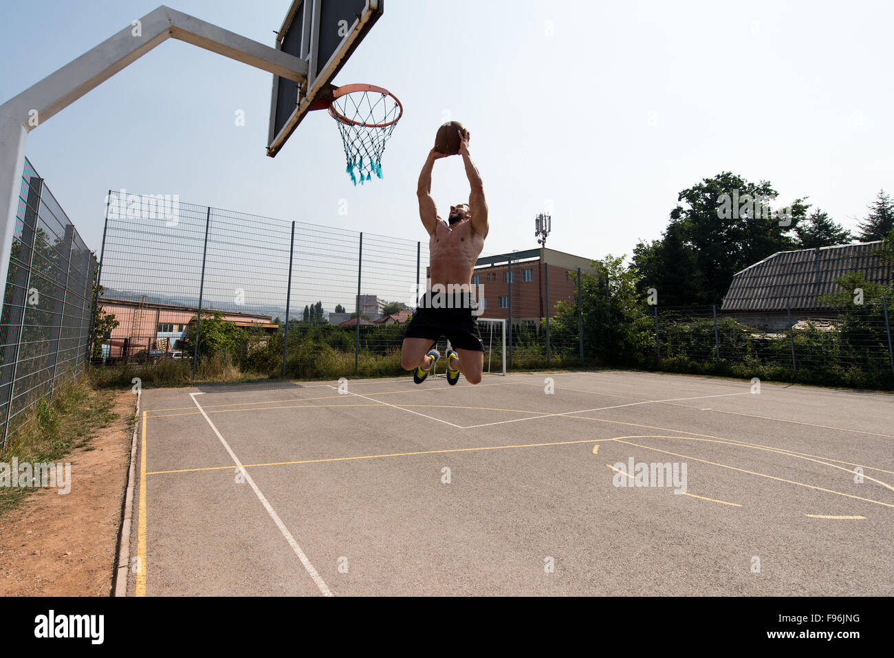 Basketball Player Bodybuilder Practicing And Posing For Basketball And ...