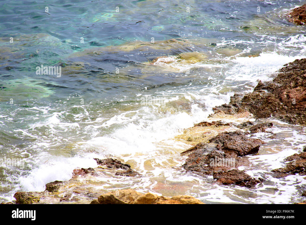 Waves on the Greek seashore Aegean sea Stock Photo - Alamy