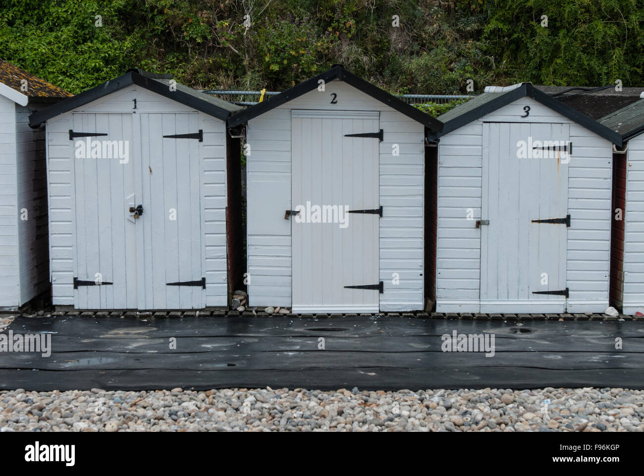 Three beach huts on Beer beach, Devon, England, UK Stock Photo - Alamy