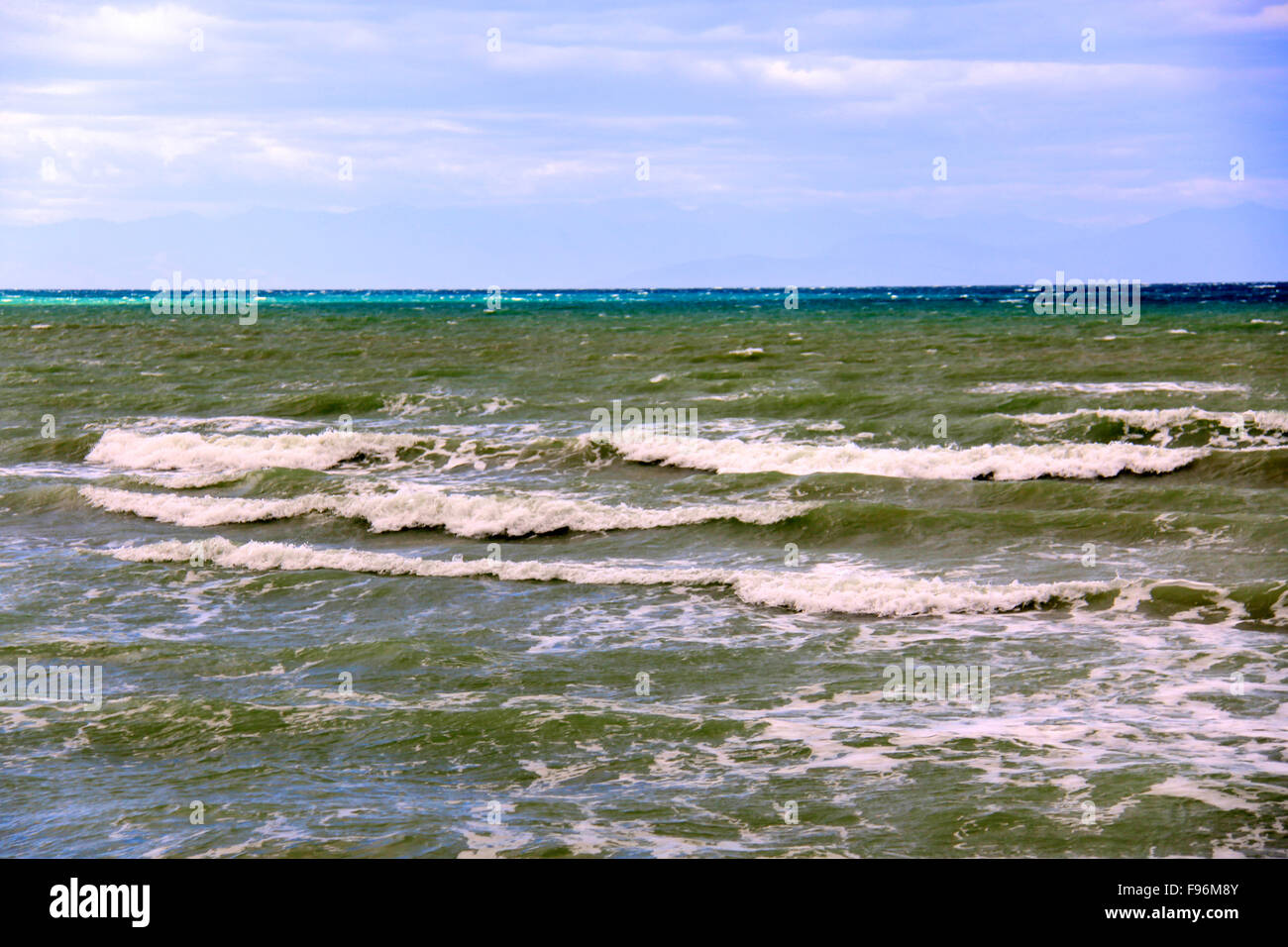 Waves on the Greek seashore Aegean sea Stock Photo - Alamy