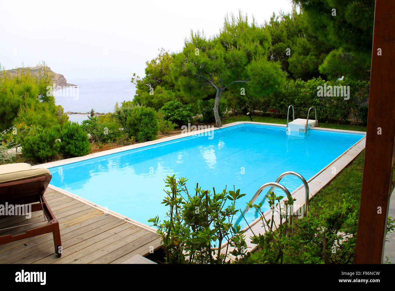 tropical swimming pool near the beach Stock Photo - Alamy