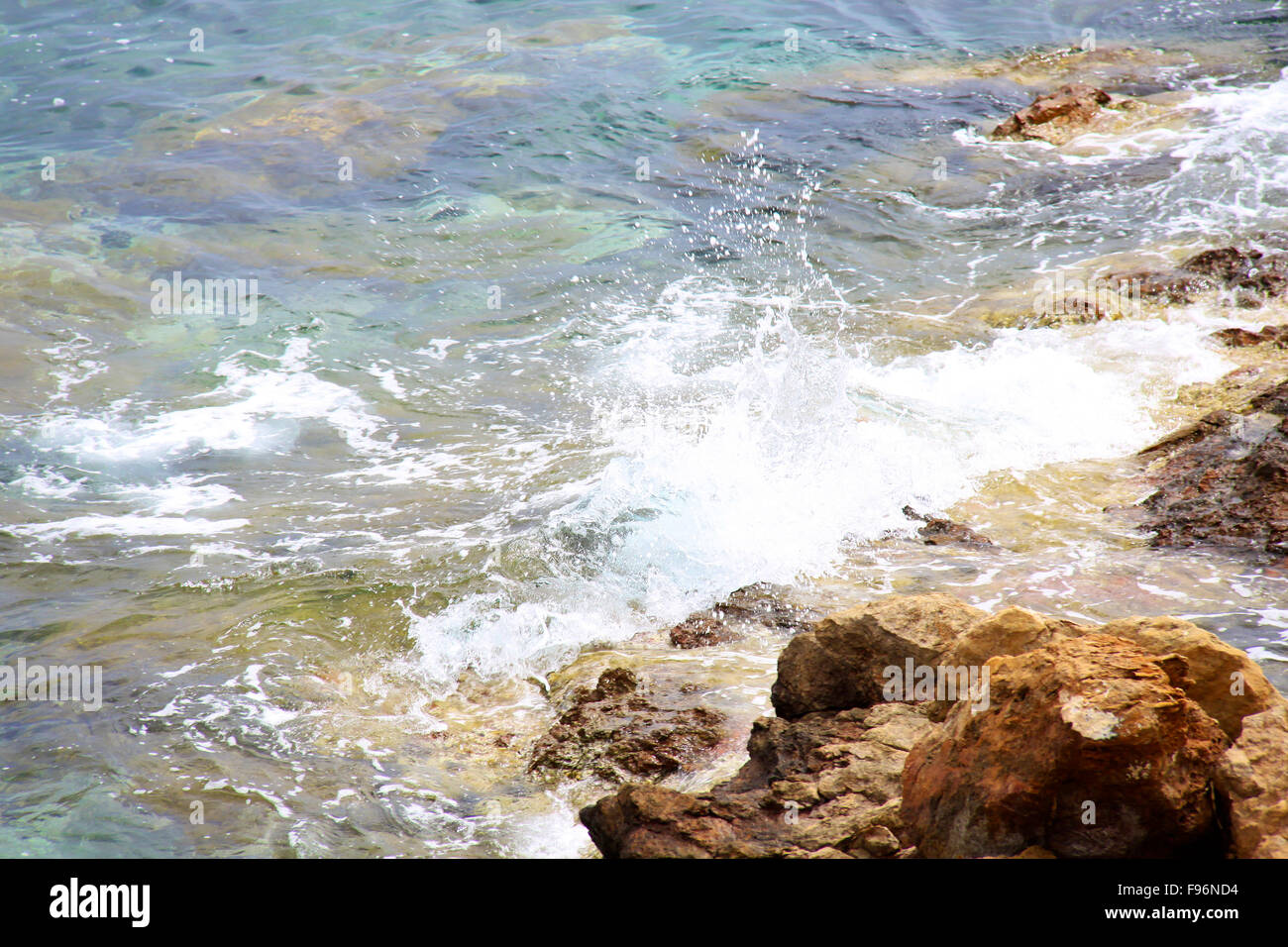 Waves on the Greek seashore Aegean sea Stock Photo - Alamy