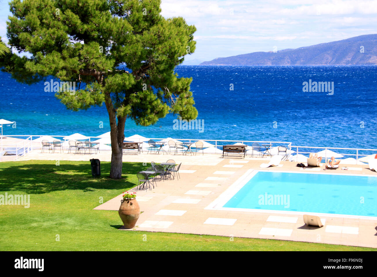 tropical swimming pool near the beach Stock Photo - Alamy