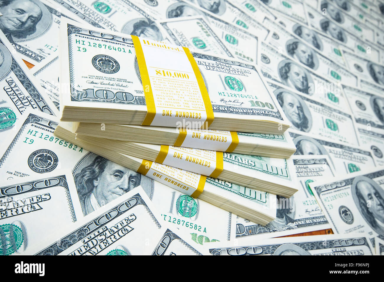 Stack of dollars on money background Stock Photo - Alamy
