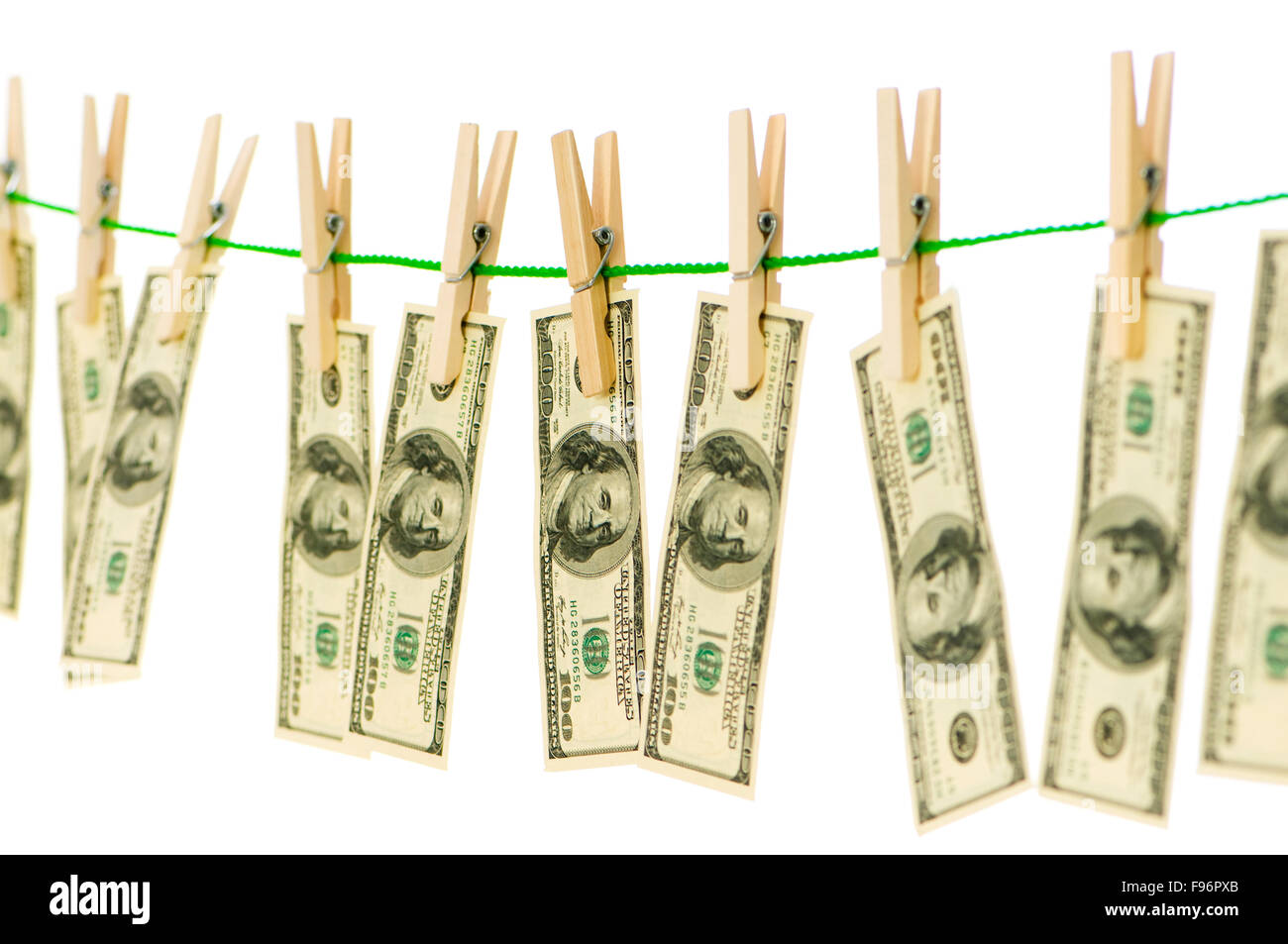 Money laundering concept with dollars on the rope Stock Photo - Alamy
