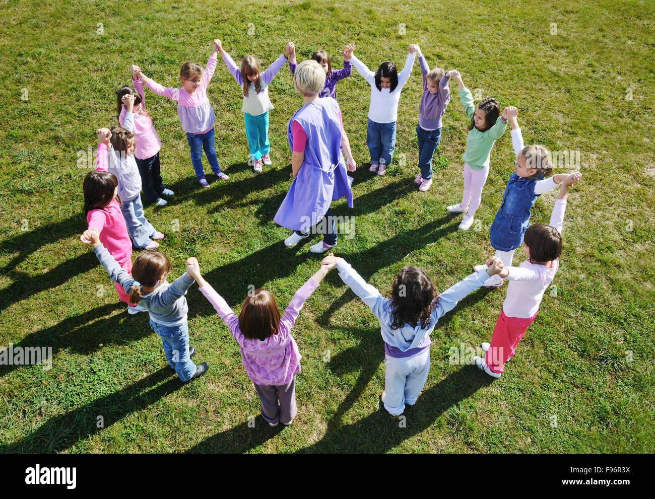 happy child kids group have fun and play at kindergarden outdoor ...