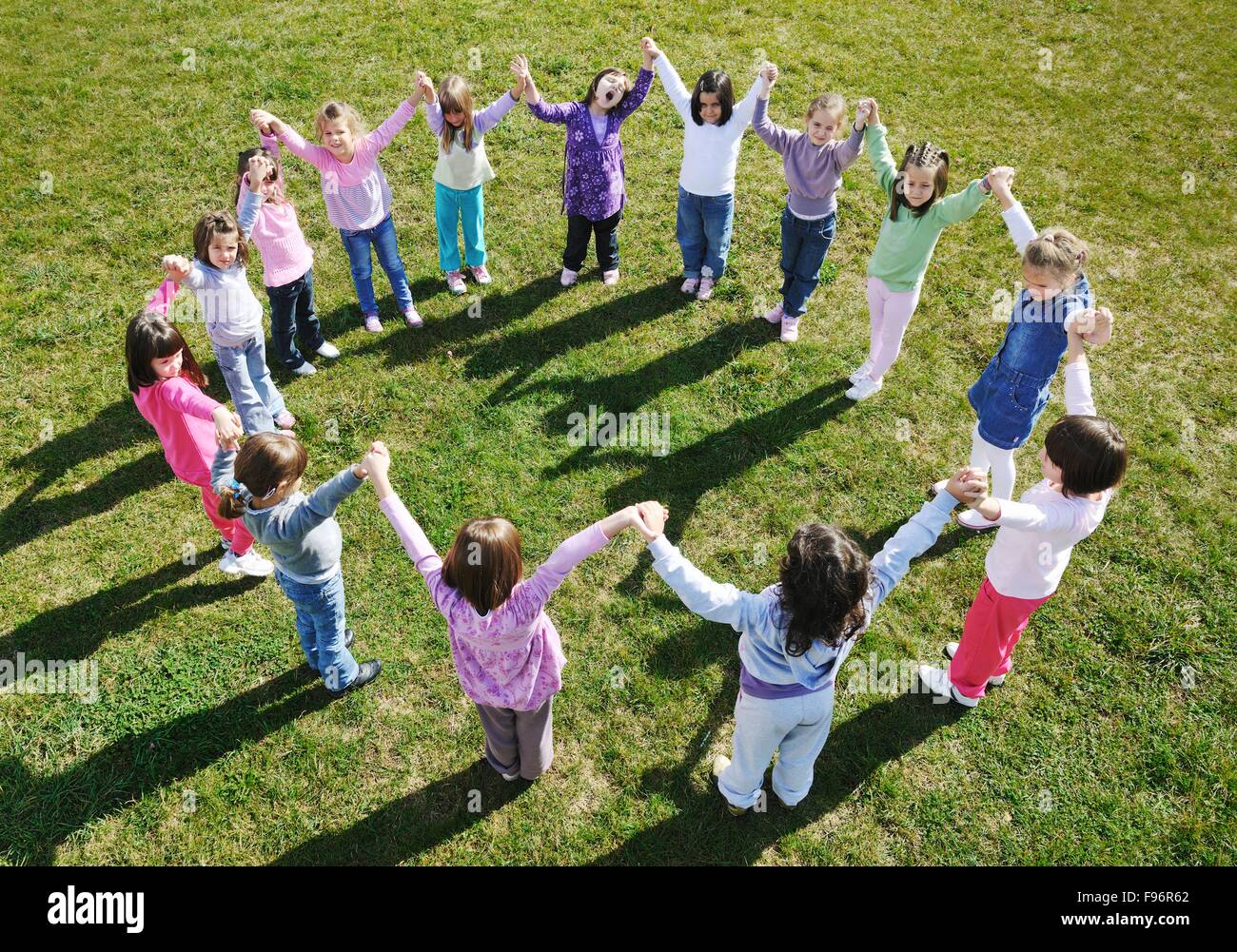 happy child kids group have fun and play at kindergarden outdoor ...