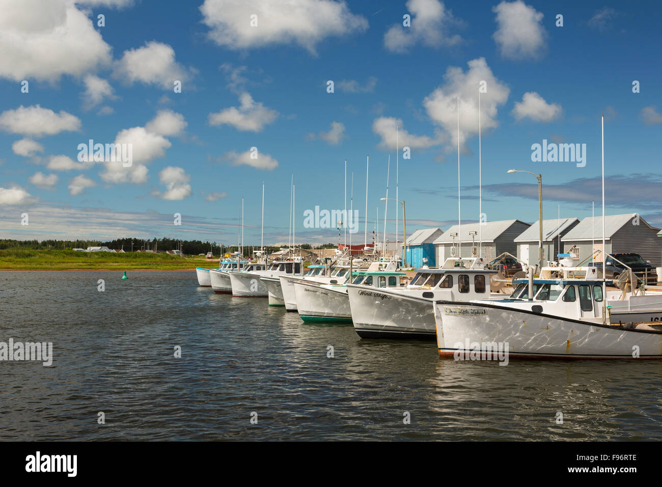 Fishing boats tied up at wharf, Tignish Harbour, Prince Edward Island ...