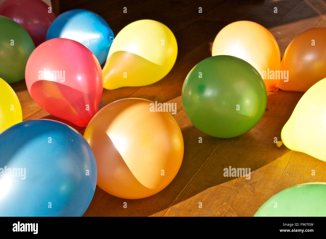 Colorful Balloons Scattered On Floor Stock Photo - Alamy