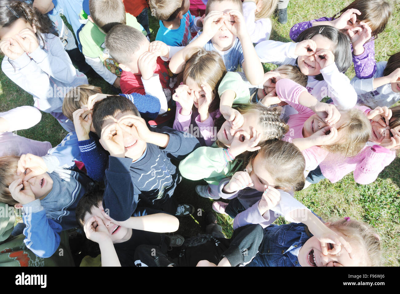 happy child kids group have fun and play at kindergarden indoor ...