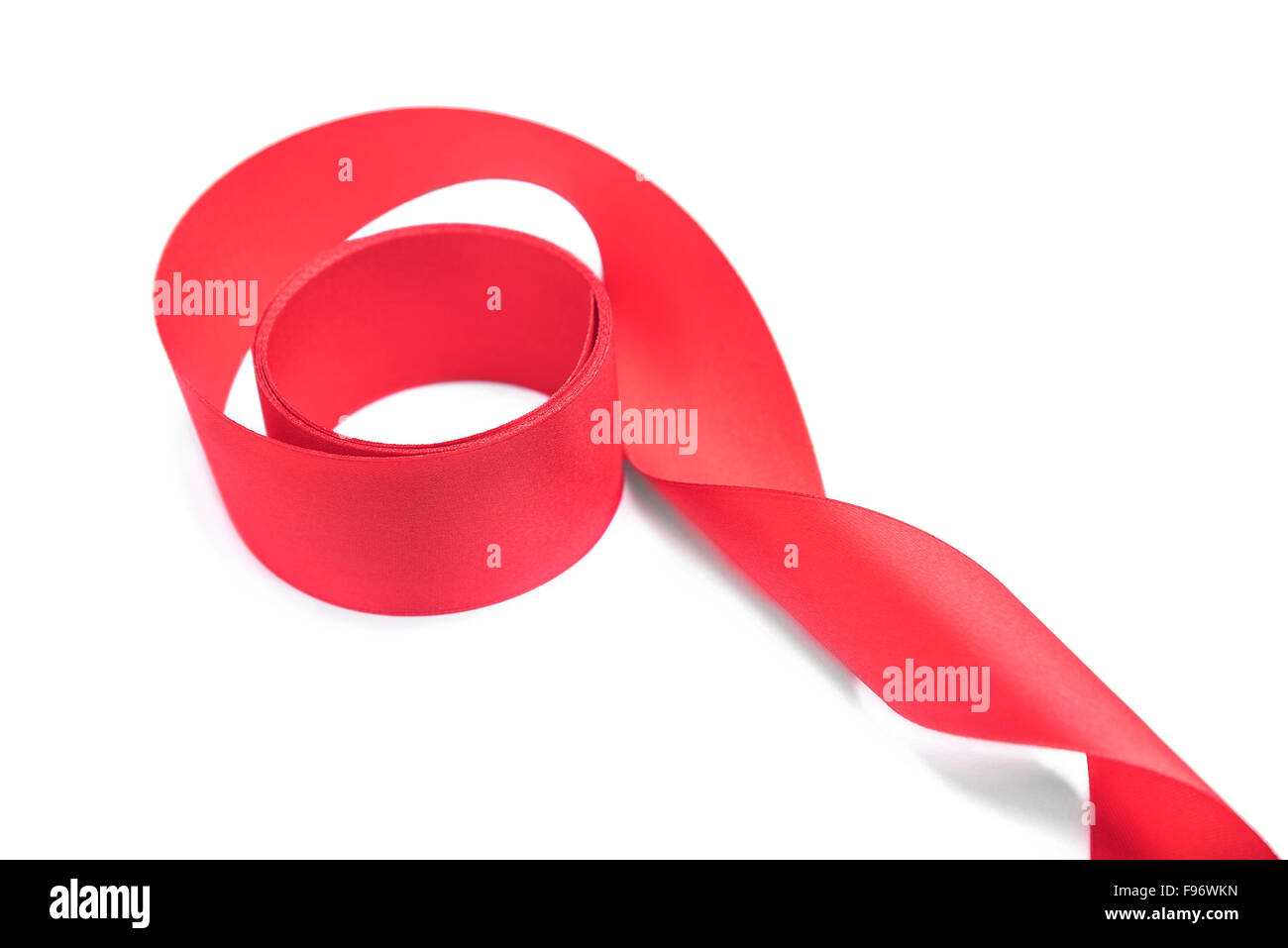 Skein of red satin ribbon Stock Photo - Alamy