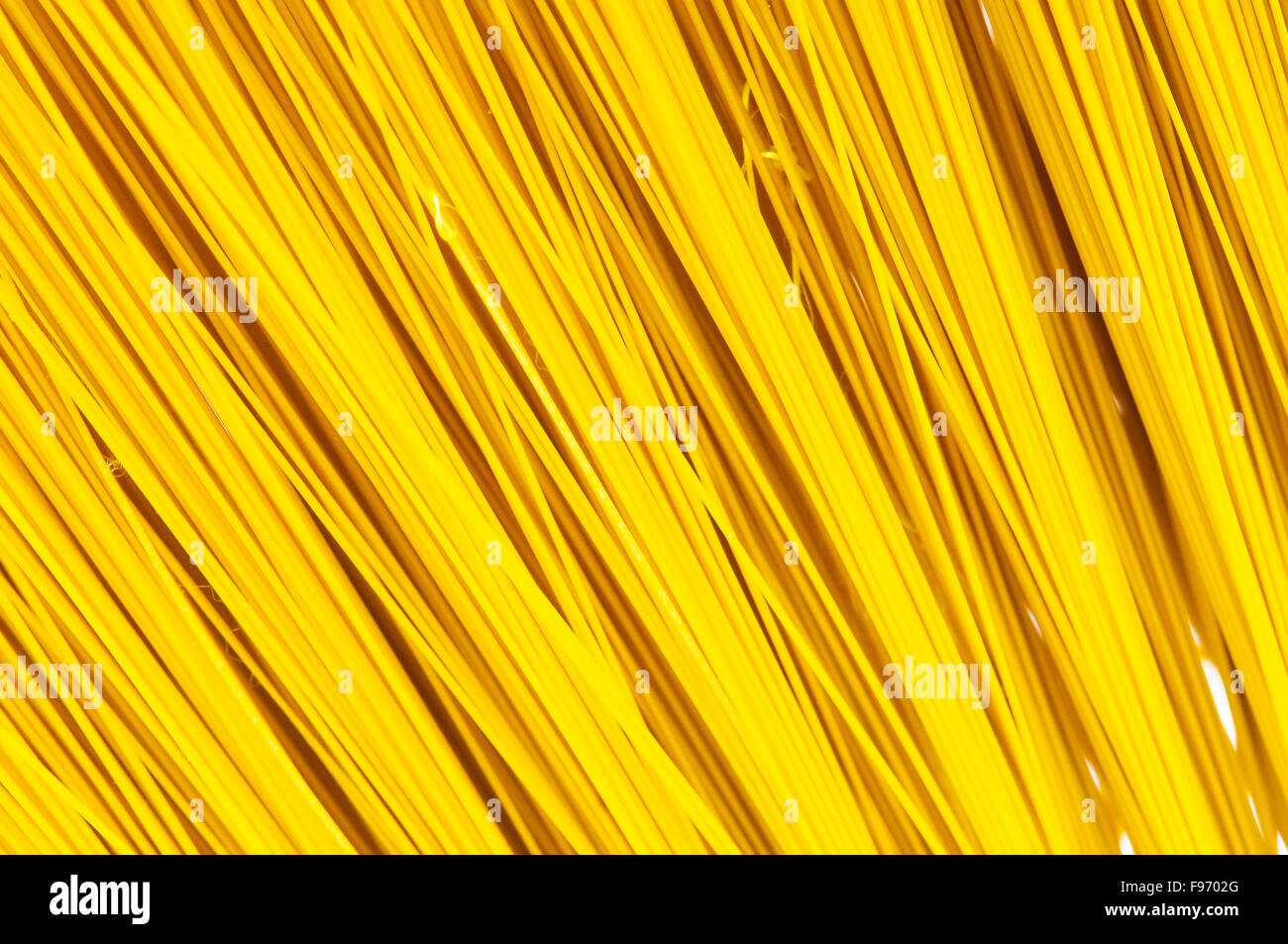 Long spaghetti arranged at background Stock Photo - Alamy
